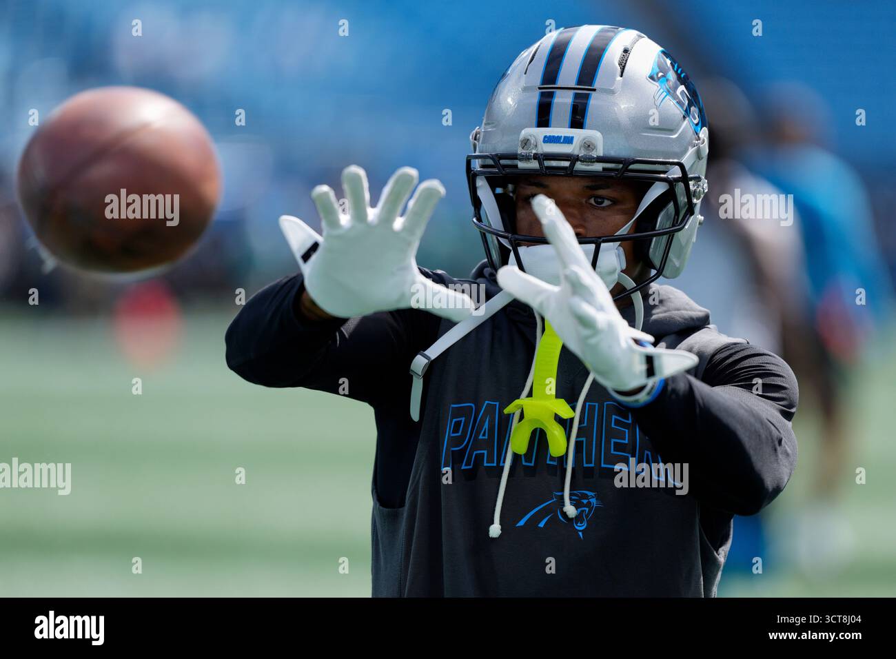 Carolina Panthers wide receiver Jimmy Horn Jr. warms up an NFL football ...