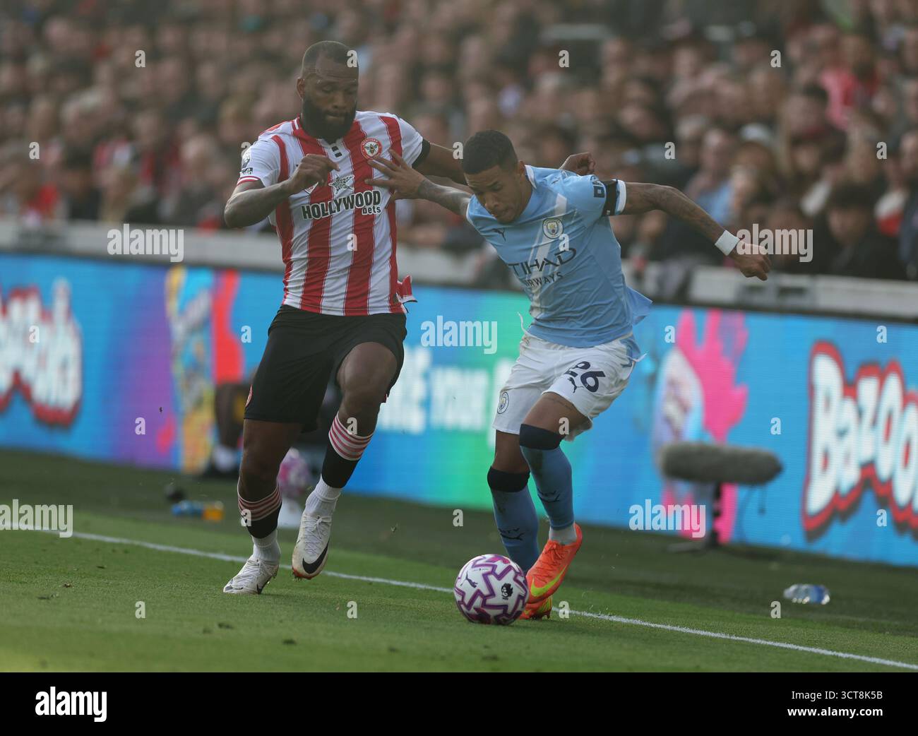 Manchester City's Savio and Brentford's Igor Thiago in action during ...