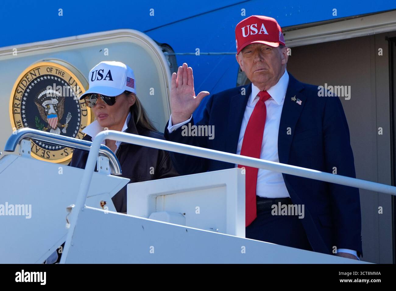 President Donald Trump and first lady Melania Trump arrive on Air Force ...