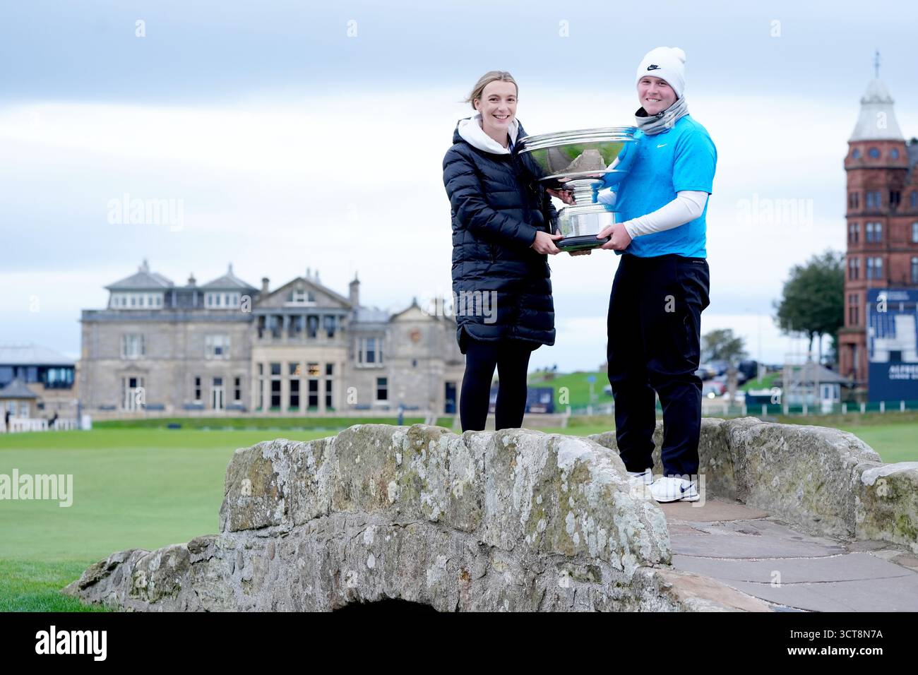 Robert McIntyre and his girlfriend, Shannon, pose with the trophy after ...