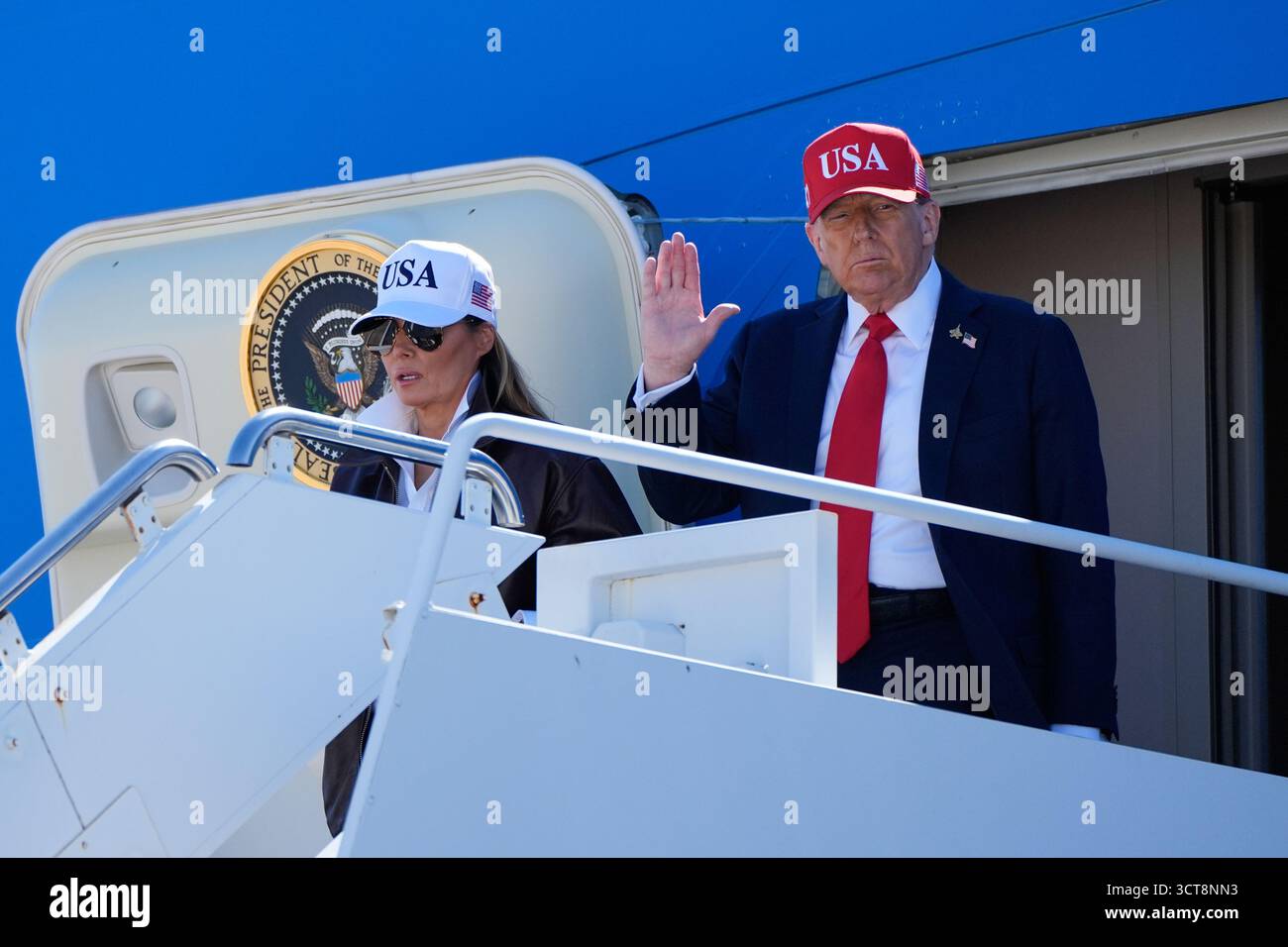 President Donald Trump and first lady Melania Trump arrive on Air Force ...