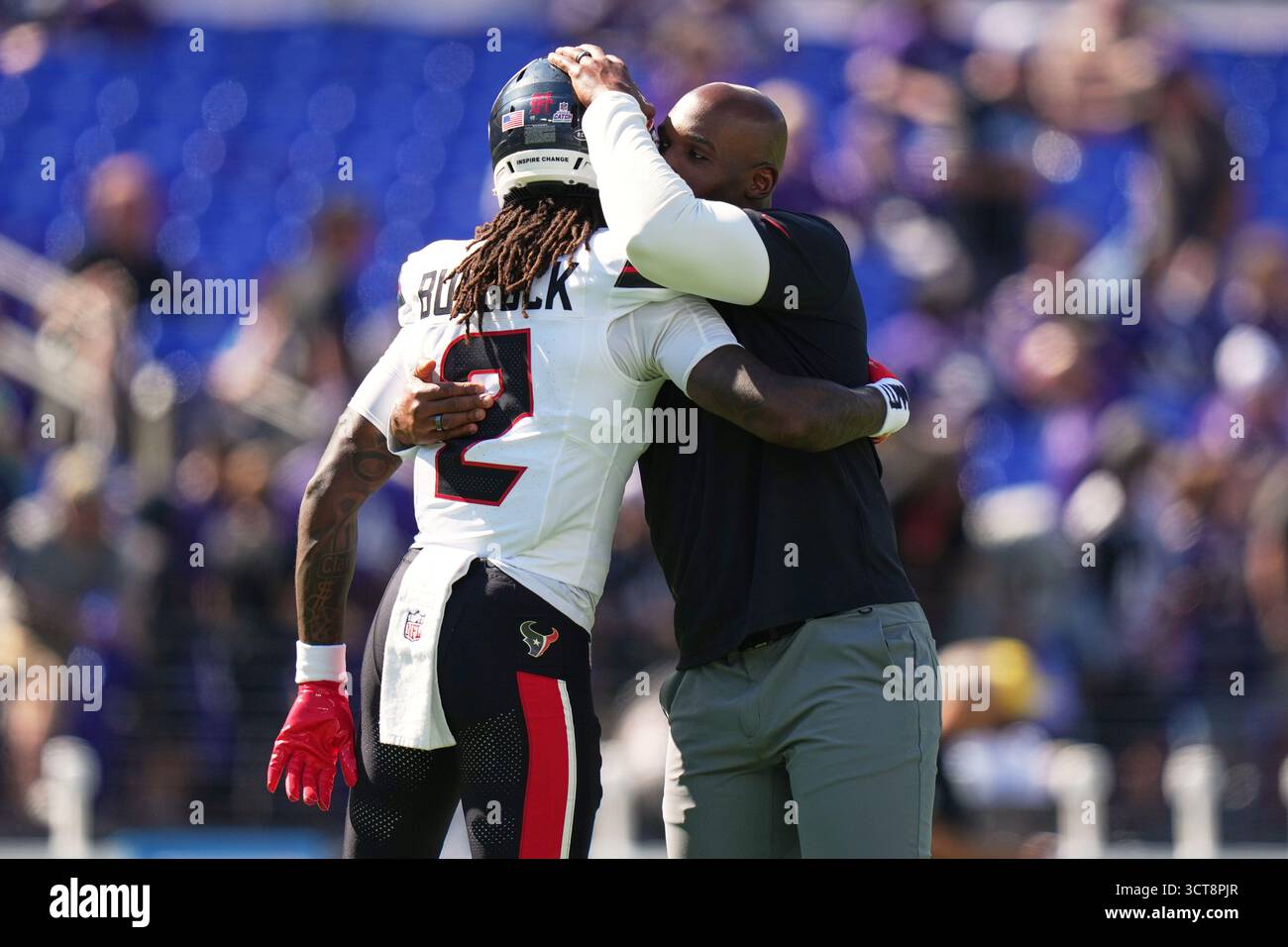 Houston Texans safety Calen Bullock (2) greets head coach Demeco Ryans ...