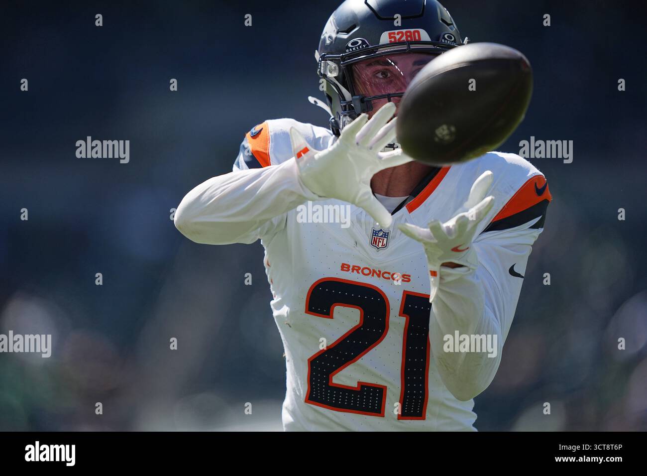 Denver Broncos cornerback Riley Moss warms up before an NFL football ...