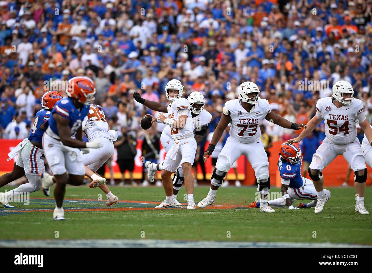 Texas quarterback Arch Manning, center, looks for a receiver during the ...
