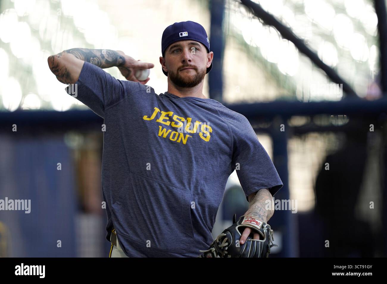 Milwaukee Brewers second baseman Brice Turang warms up before Game 1 of ...