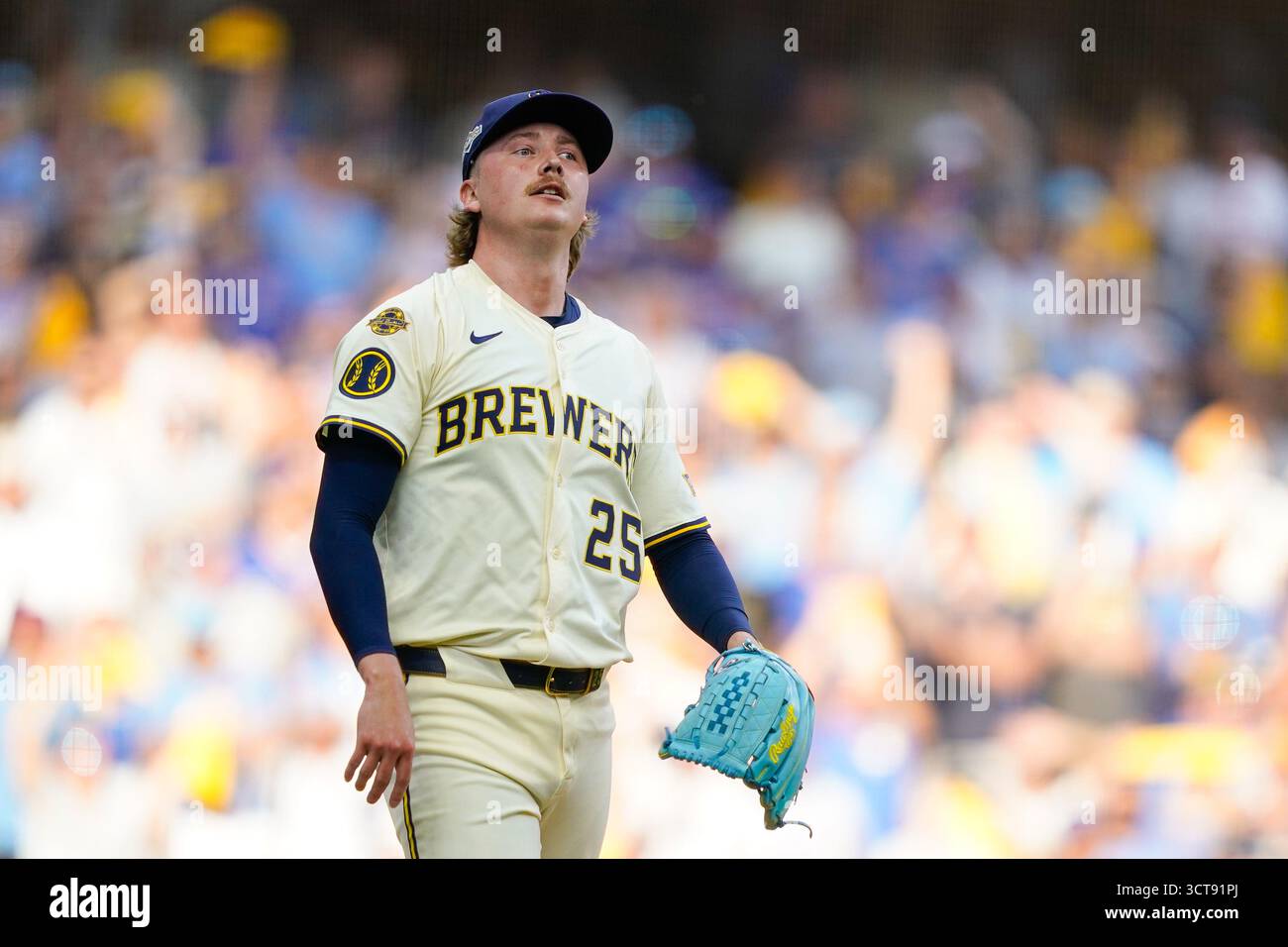 Milwaukee Brewers pitcher Nick Mears looks towards first base during ...