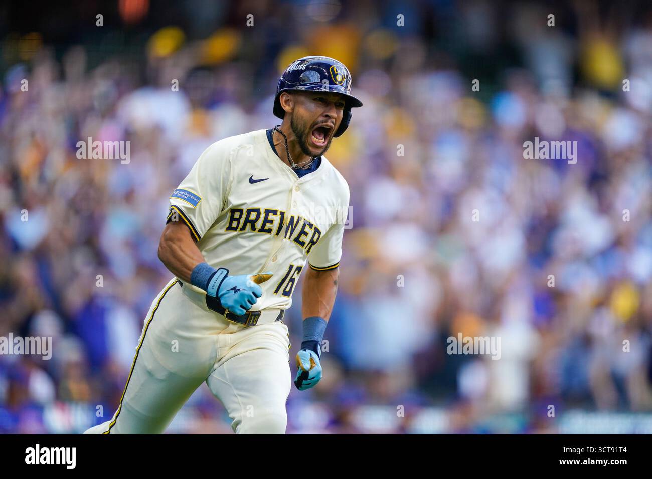 Milwaukee Brewers' Blake Perkins reacts to hitting an RBI single during ...