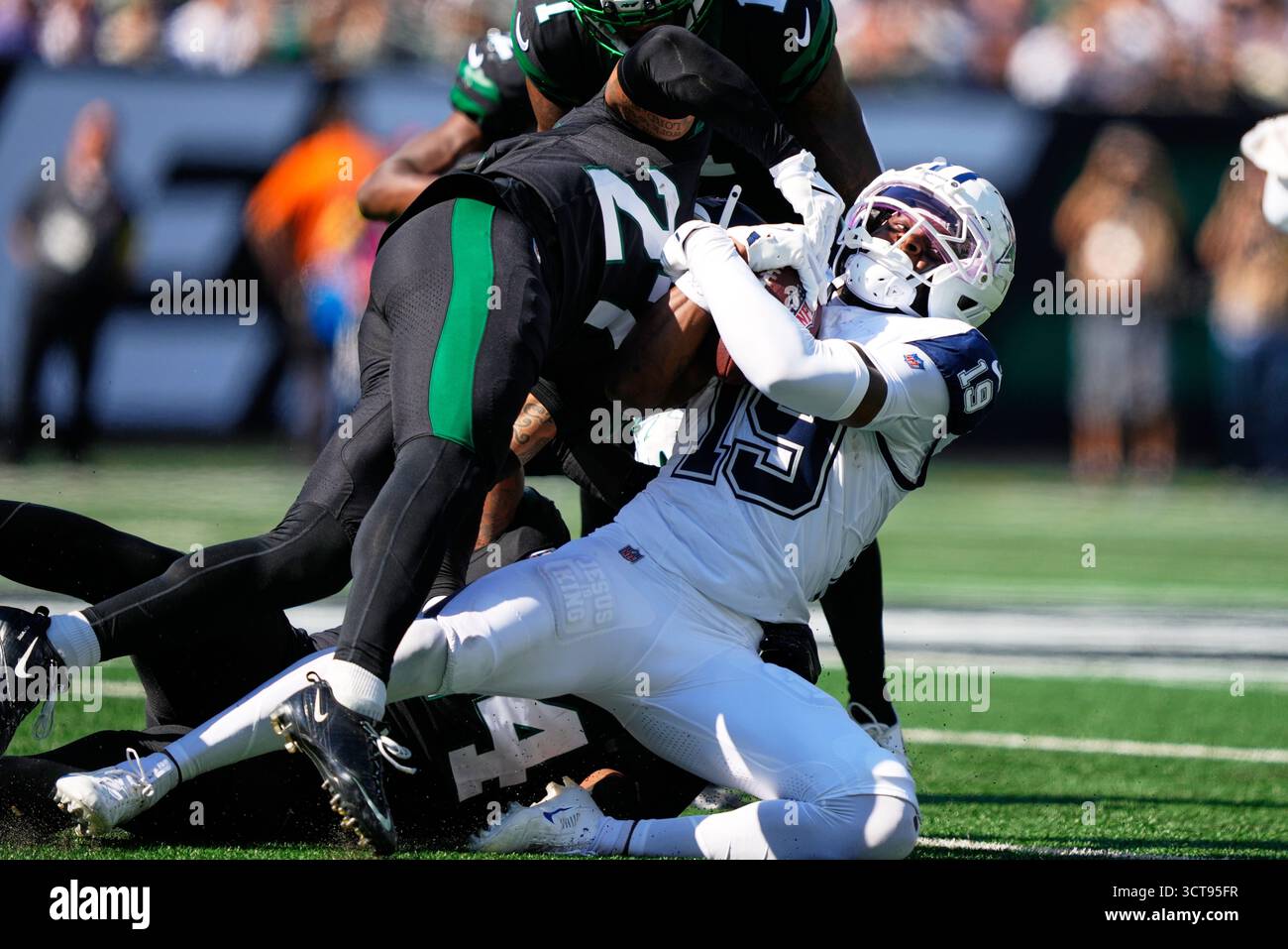 New York Jets' Malachi Moore stops Dallas Cowboys' Ryan Flournoy during ...