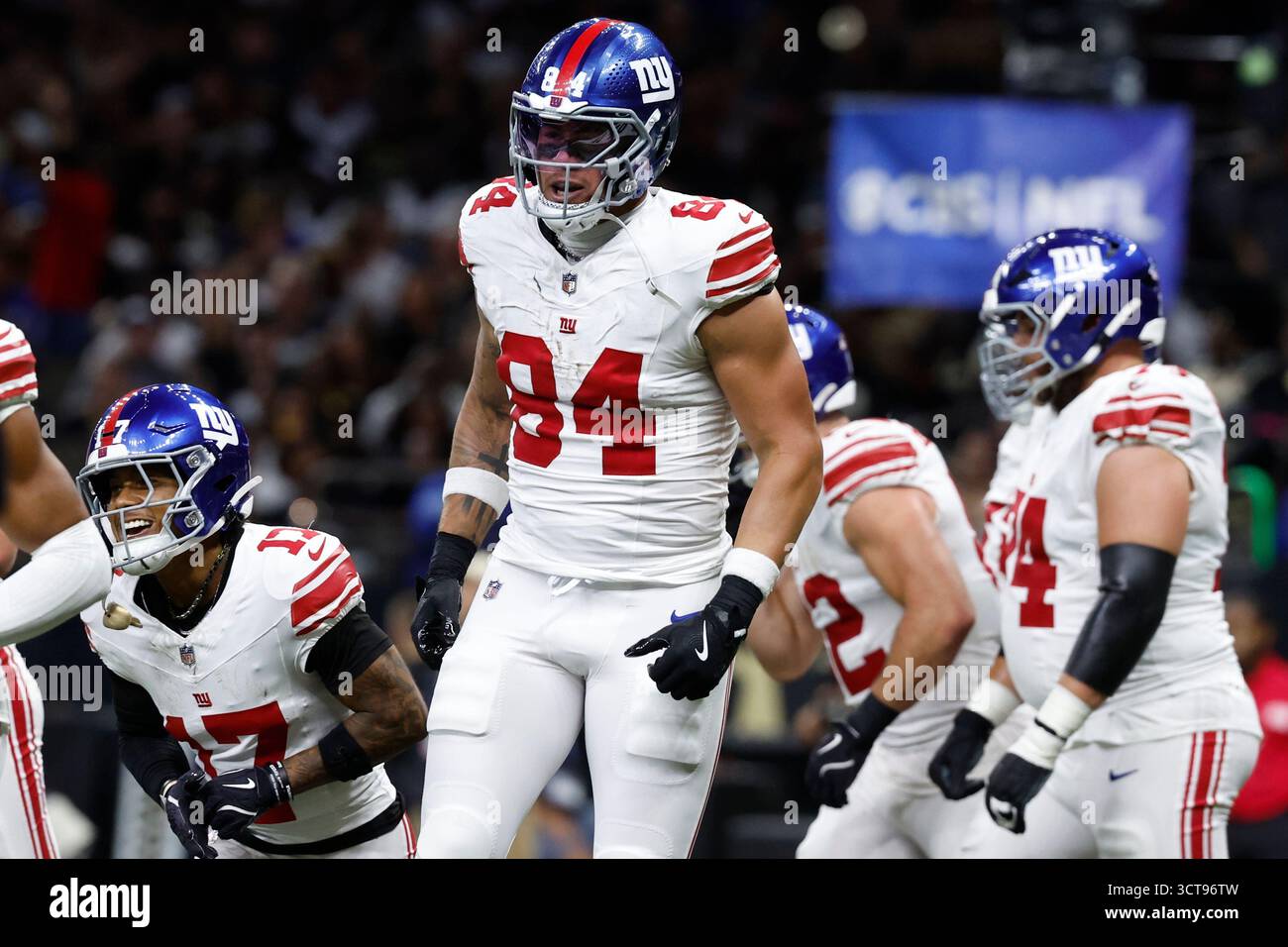 New York Giants tight end Theo Johnson (84) celebrates his touchdown ...