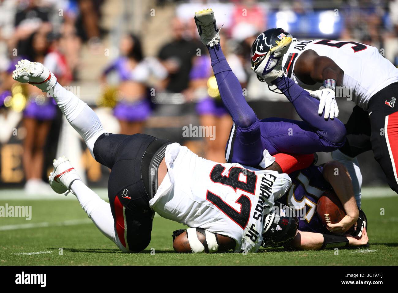 Baltimore Ravens quarterback Cooper Rush (15) is sacked by Houston ...