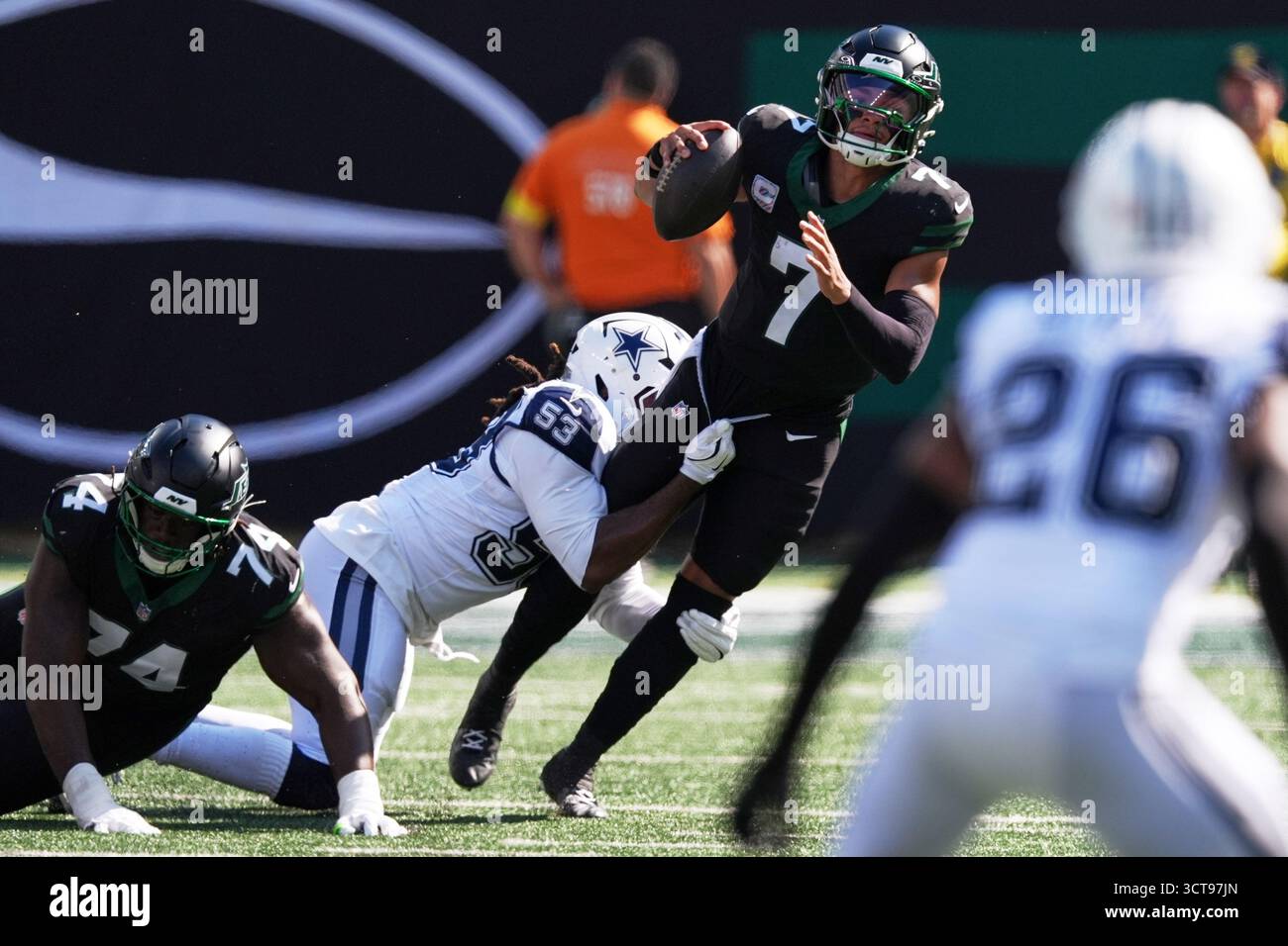 Dallas Cowboys' James Houston sacks New York Jets' Justin Fields during ...