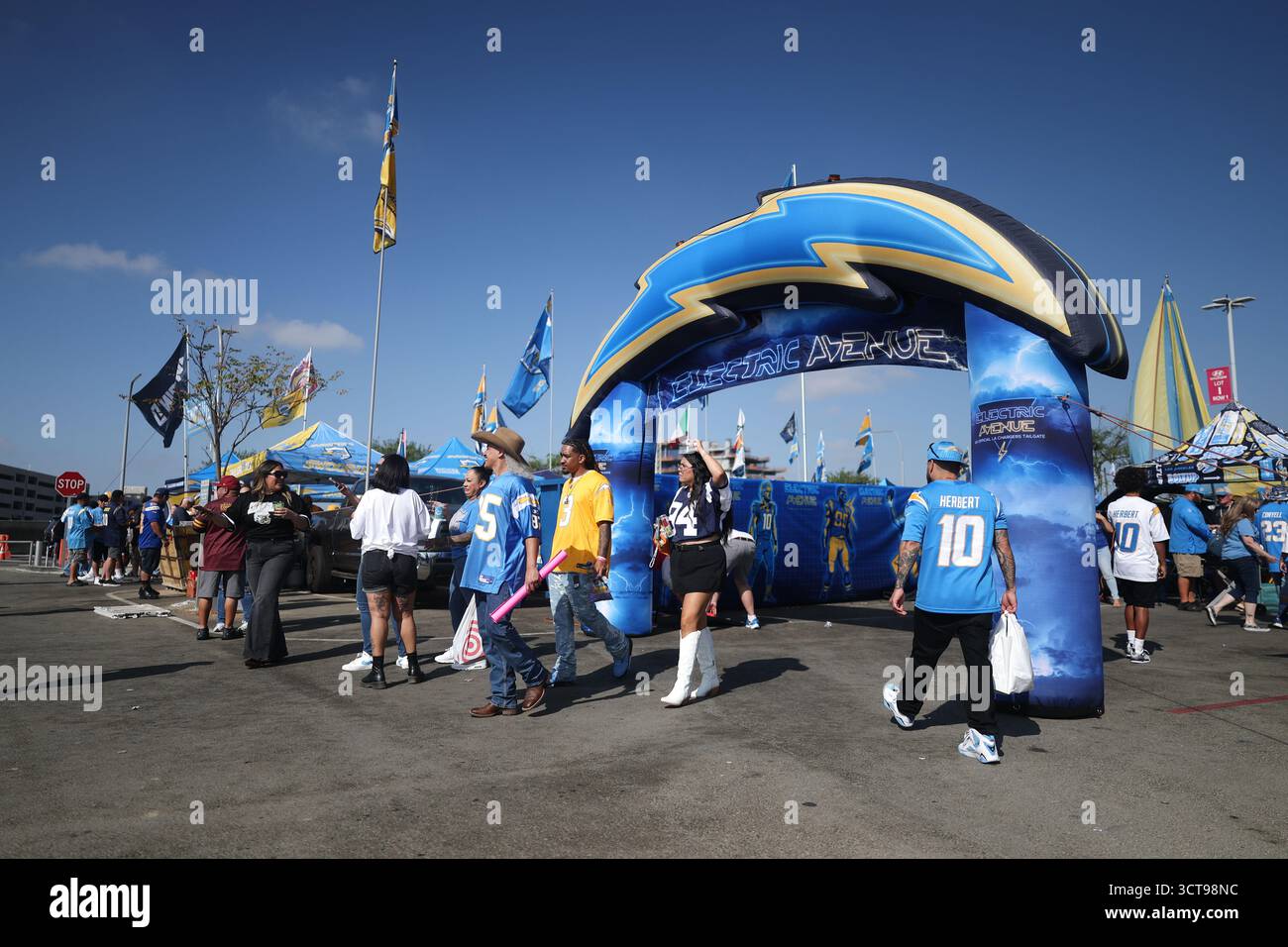 Fans tailgate before an NFL football game between the Los Angeles ...