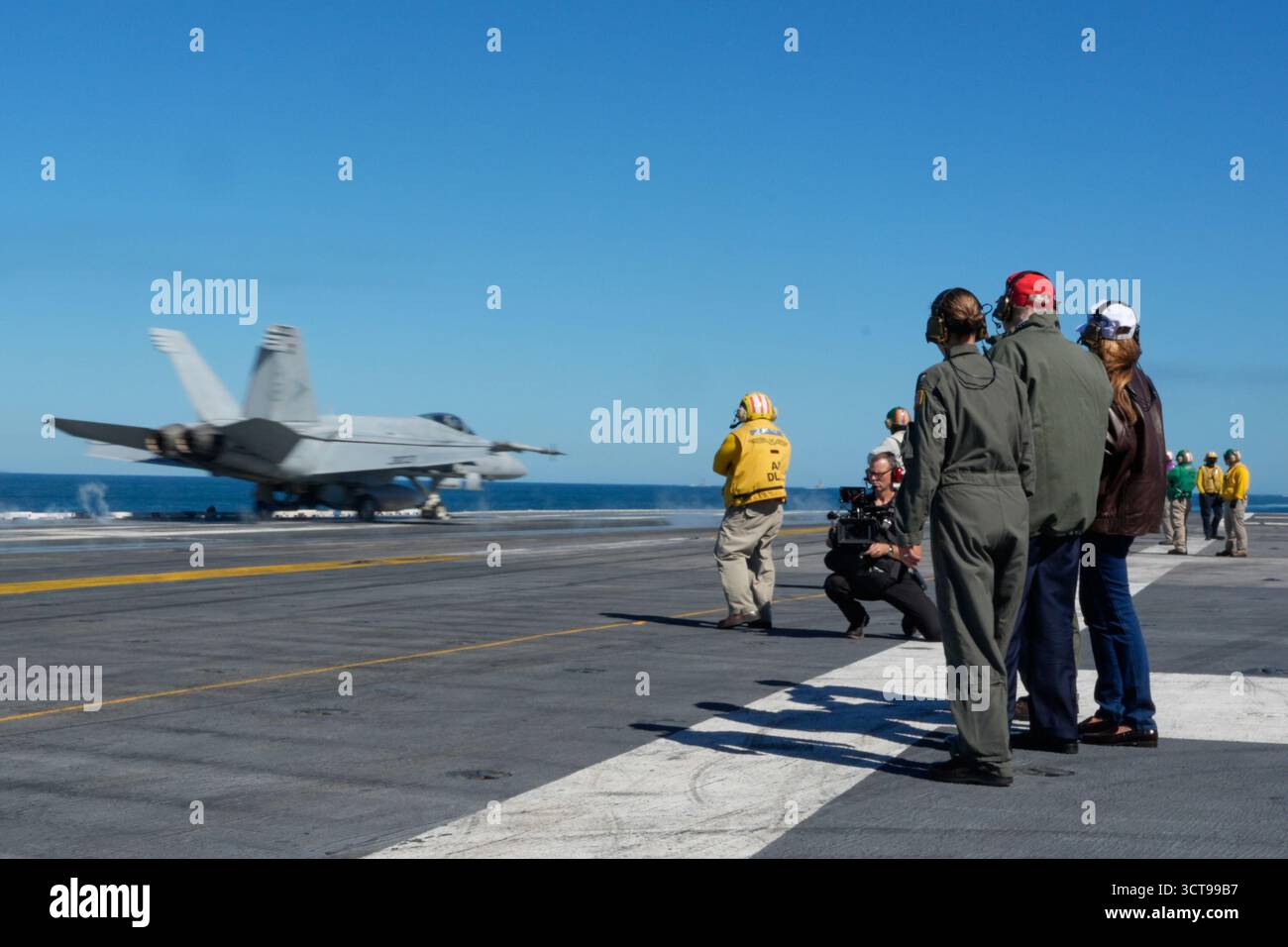 President Donald Trump and first lady Melania Trump watch a naval sea ...