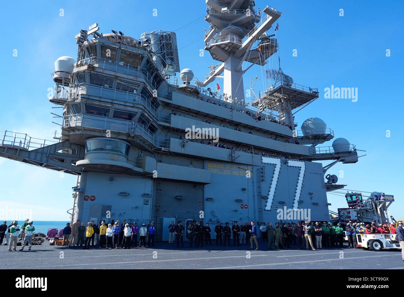Sailors watch as President Donald Trump and first lady Melania Trump ...