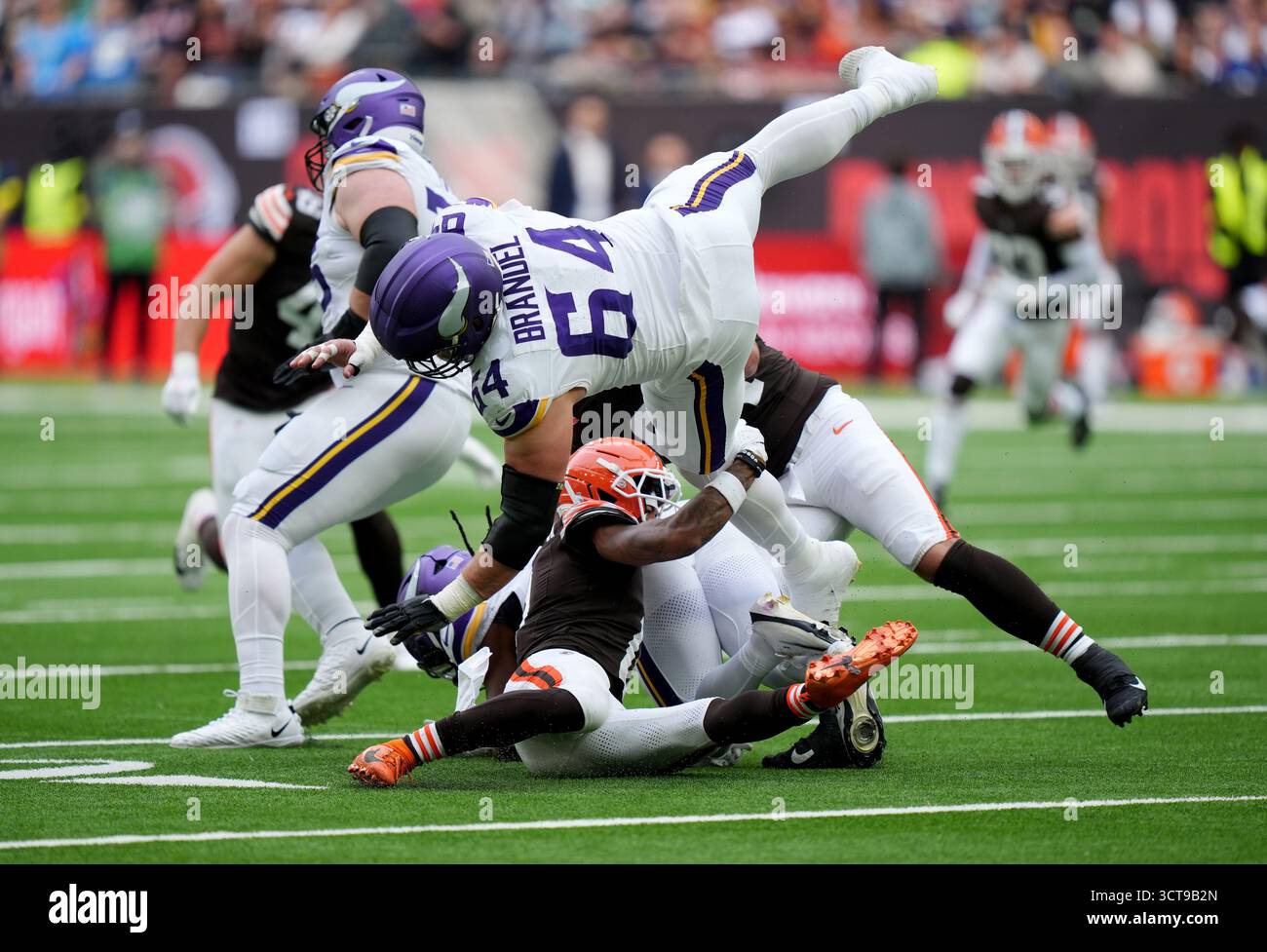 Minnesota Vikings' Blake Brandel is tackled by Cleveland Browns' Greg ...