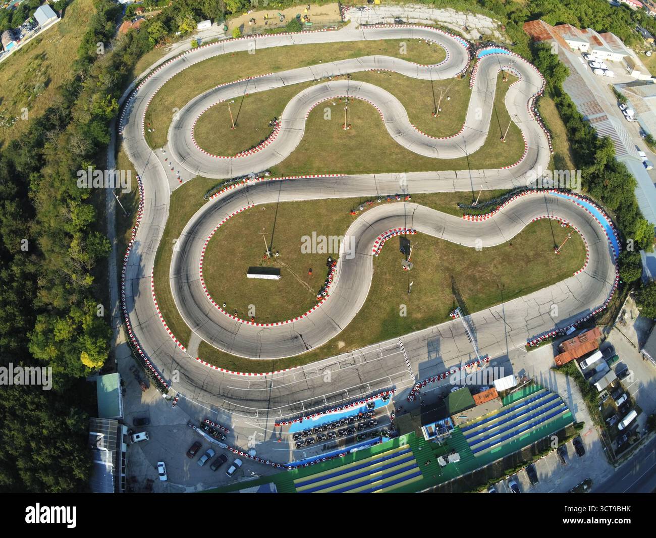 Outdoor kart racing track with winding turns and ample viewing areas ...