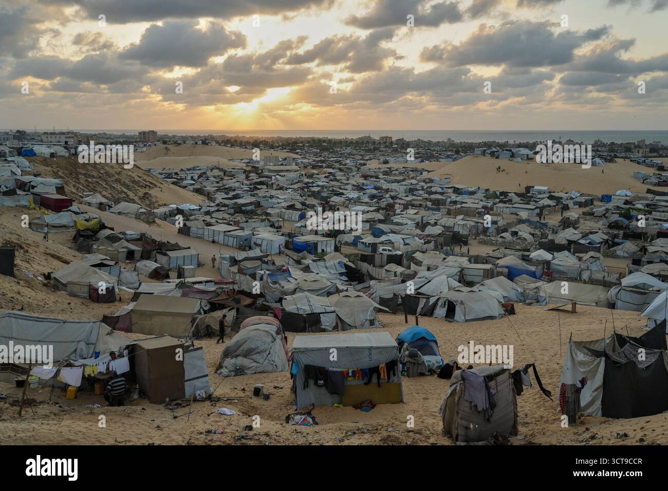 A tent camp for displaced Palestinians stretches along the Muwasi, an ...