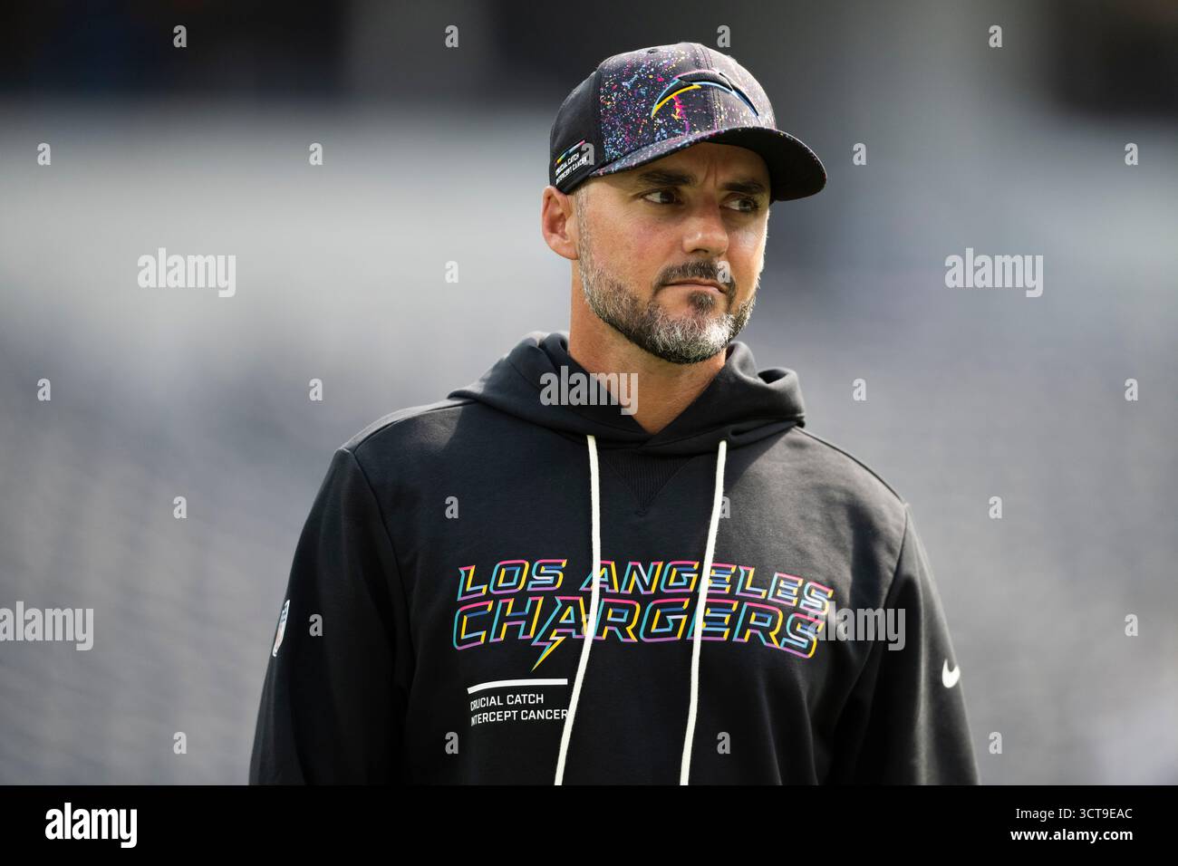 Los Angeles Chargers defensive coordinator Jesse Minter walks on the ...