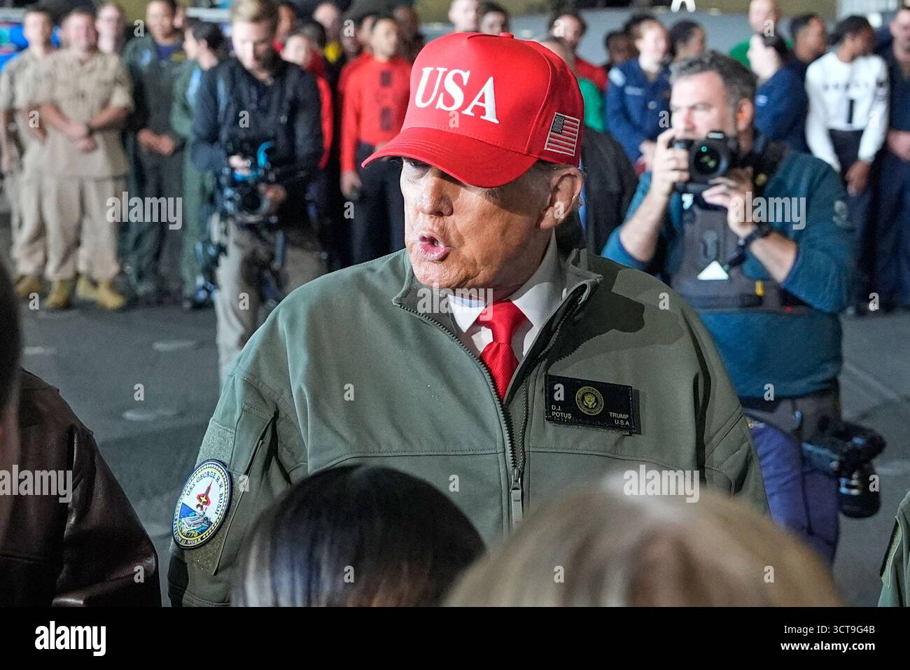 President Donald Trump greets sailors as part of the Navy's 250th ...
