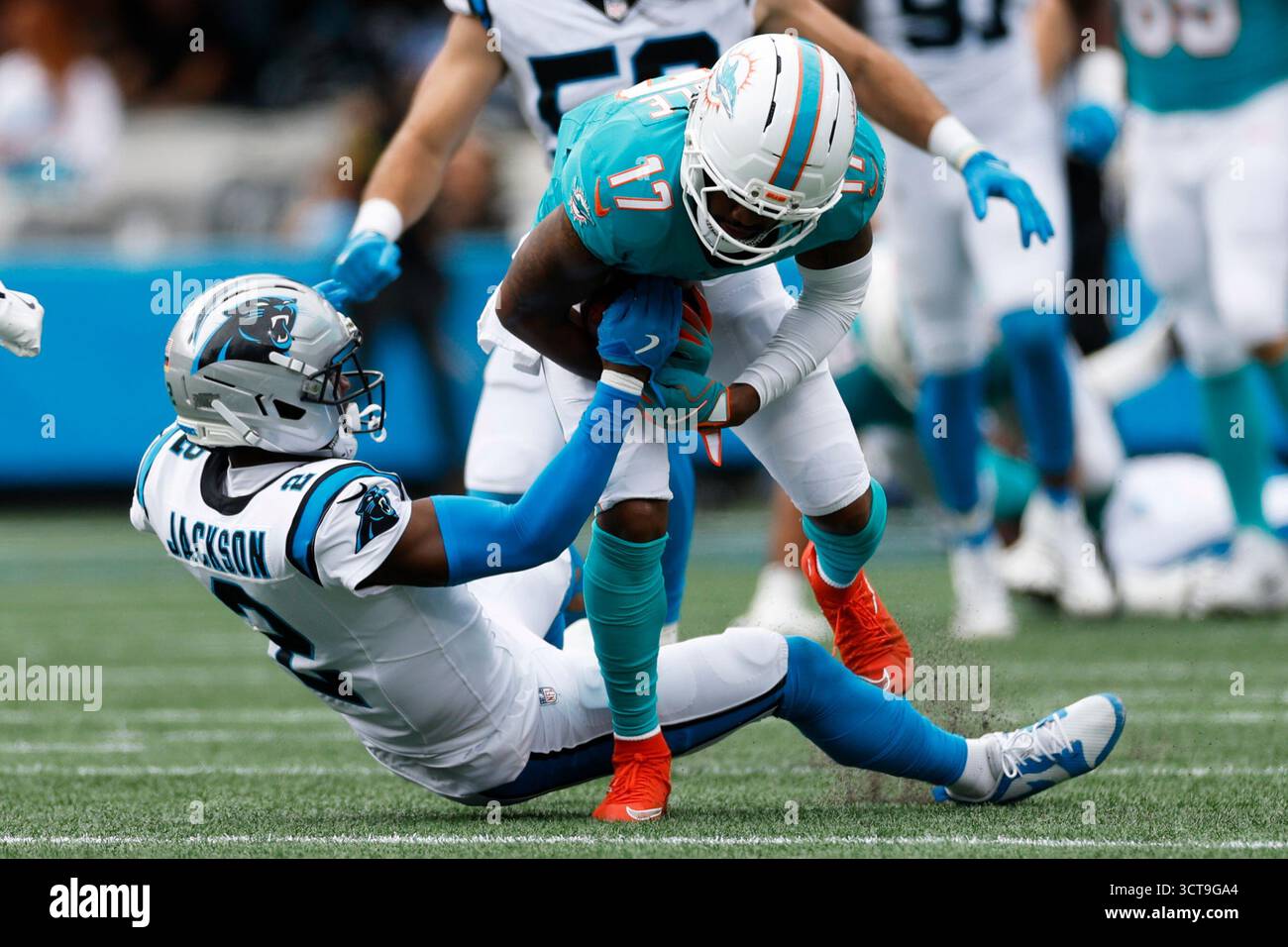 Miami Dolphins wide receiver Jaylen Waddle is tackled by Carolina ...