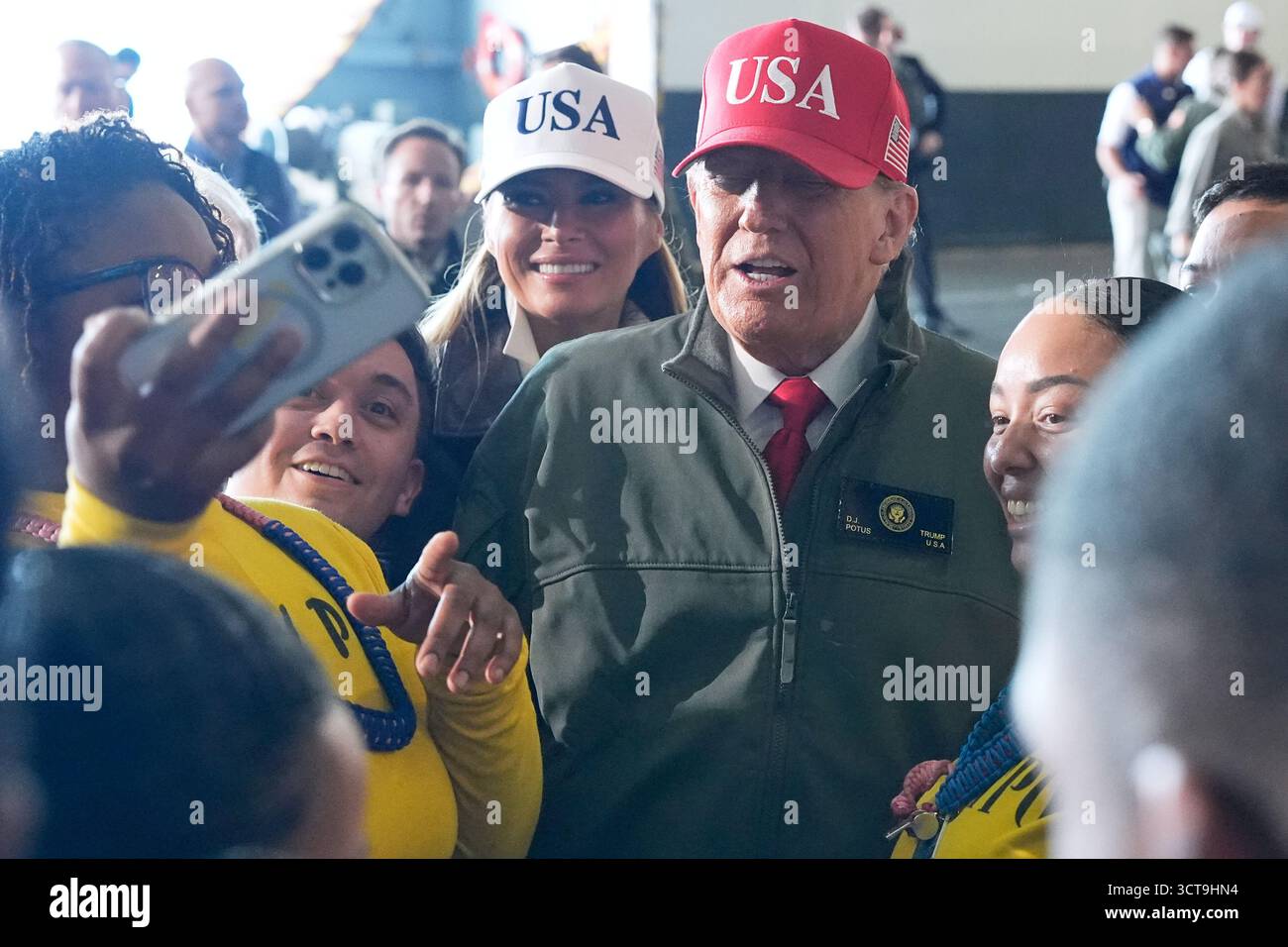 President Donald Trump and first lady Melania Trump pose for a photo as ...