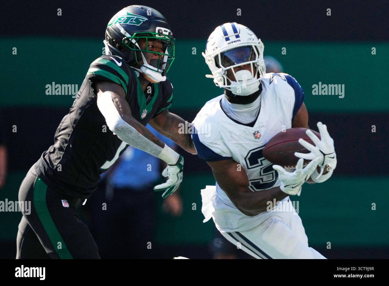 Dallas Cowboys' George Pickens catches a touchdown pass in front of New ...