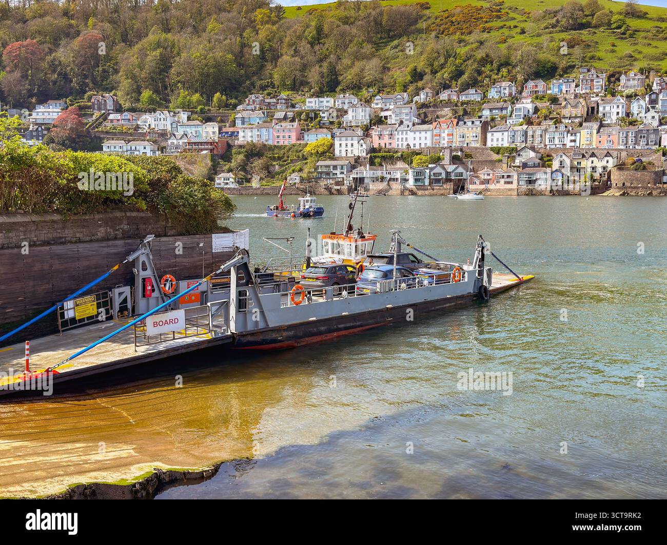 Kingswear, Devon, England, UK - 24 April 2025: Small car ferry taking ...