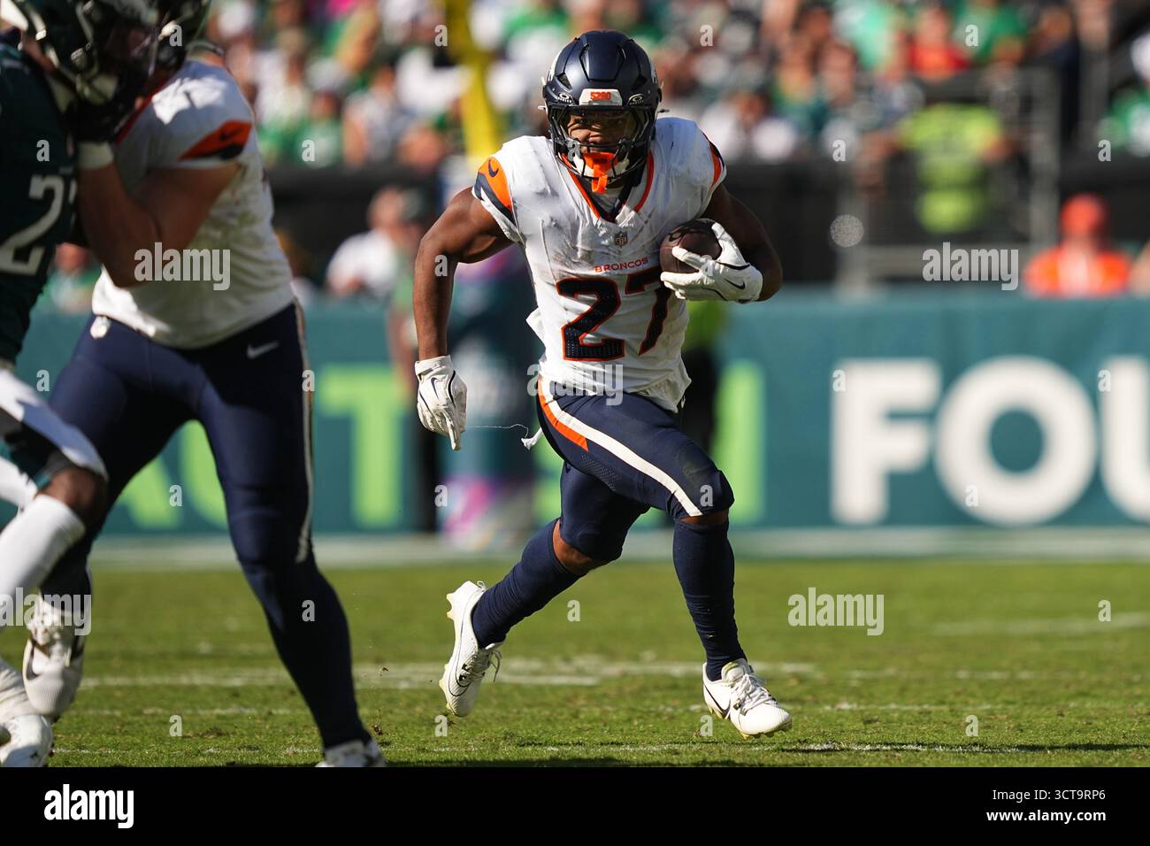Denver Broncos running back J.K. Dobbins (27) runs with the ball during ...