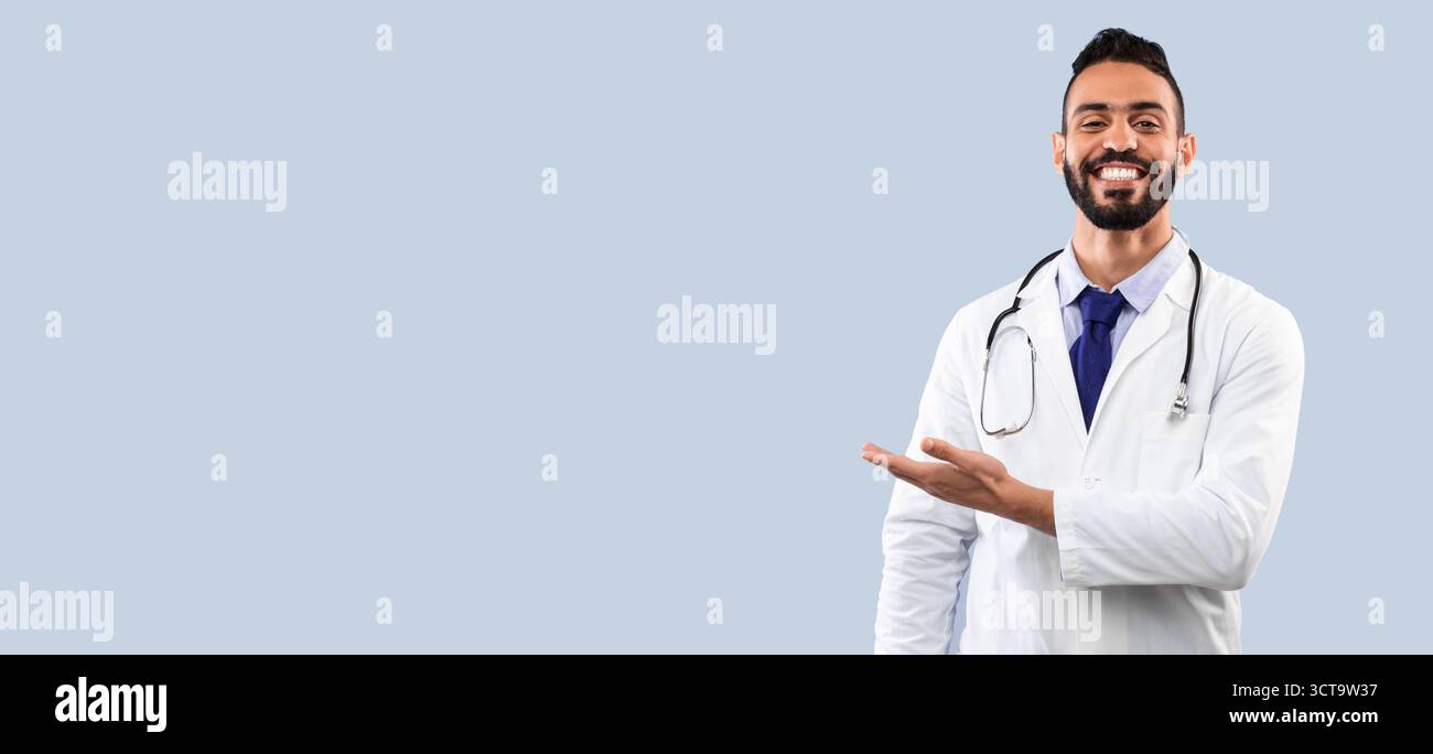 Happy Arabic Doctor Man Smiling Showing Copy Space, Blue Background ...