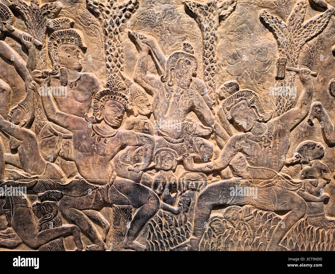 Ornate reliefs depicting ancient battle scenes grace the temple walls ...