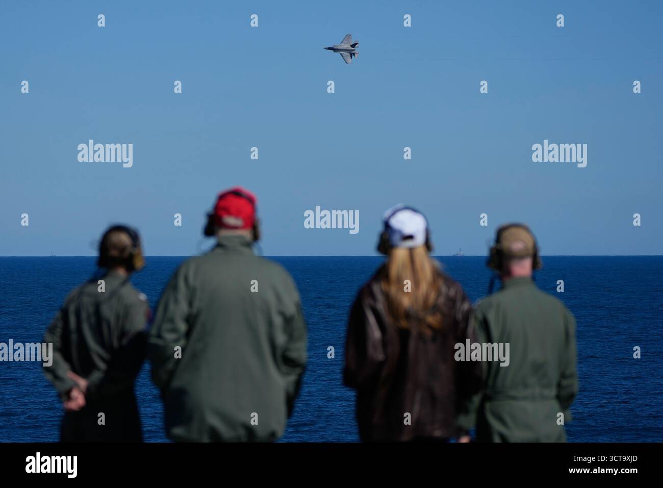 President Donald Trump and first lady Melania Trump watch a naval sea ...
