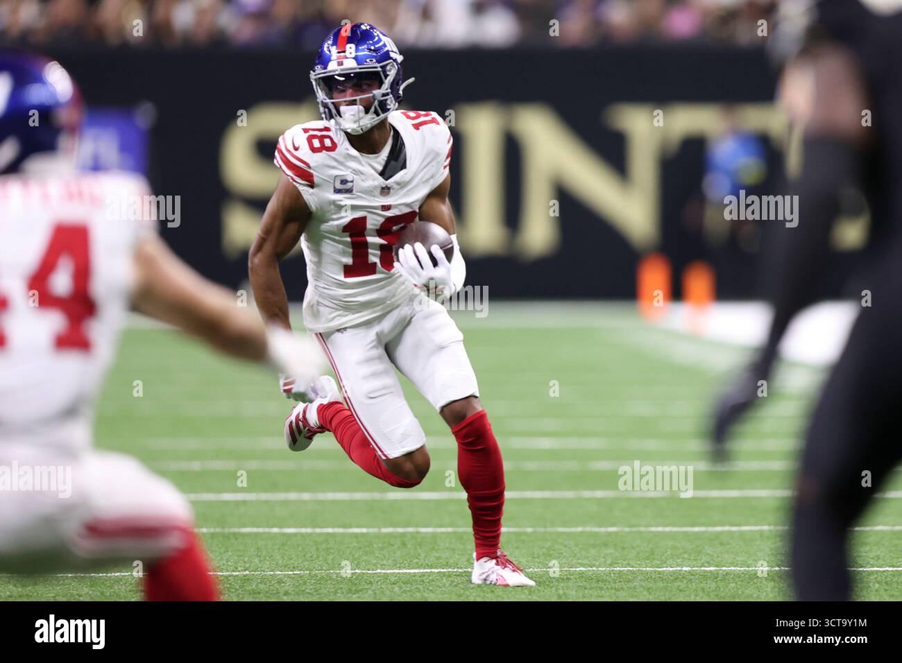 New York Giants wide receiver Darius Slayton (18) tries to gain some ...