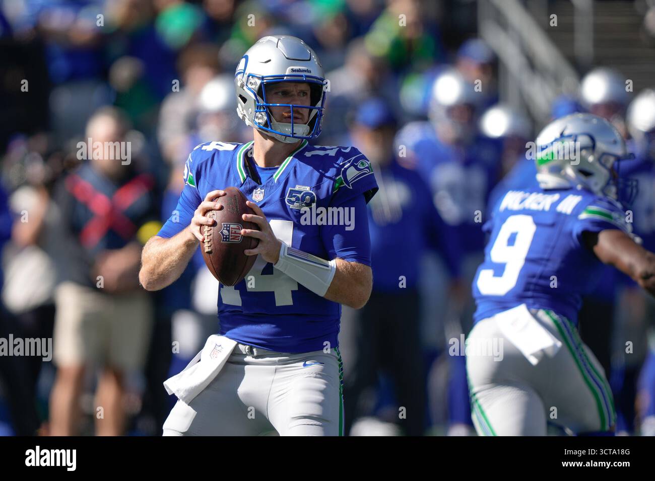 Seattle Seahawks quarterback Sam Darnold (14) looks to throw during the ...