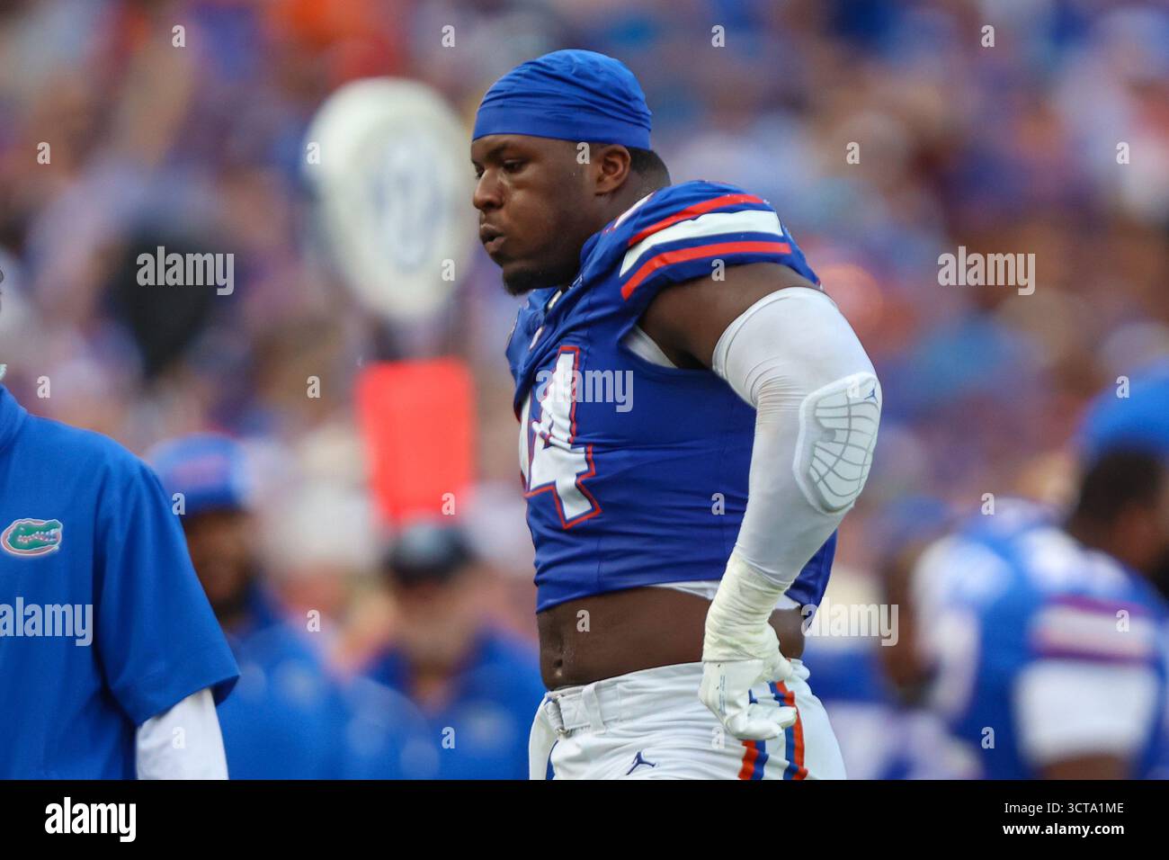 Florida edge Tyreak Sapp (94) walks the sideline during an NCAA ...