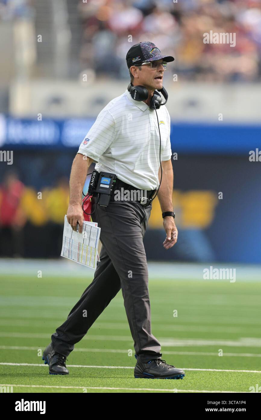 Los Angeles Chargers head coach Jim Harbaugh walks on the field before ...