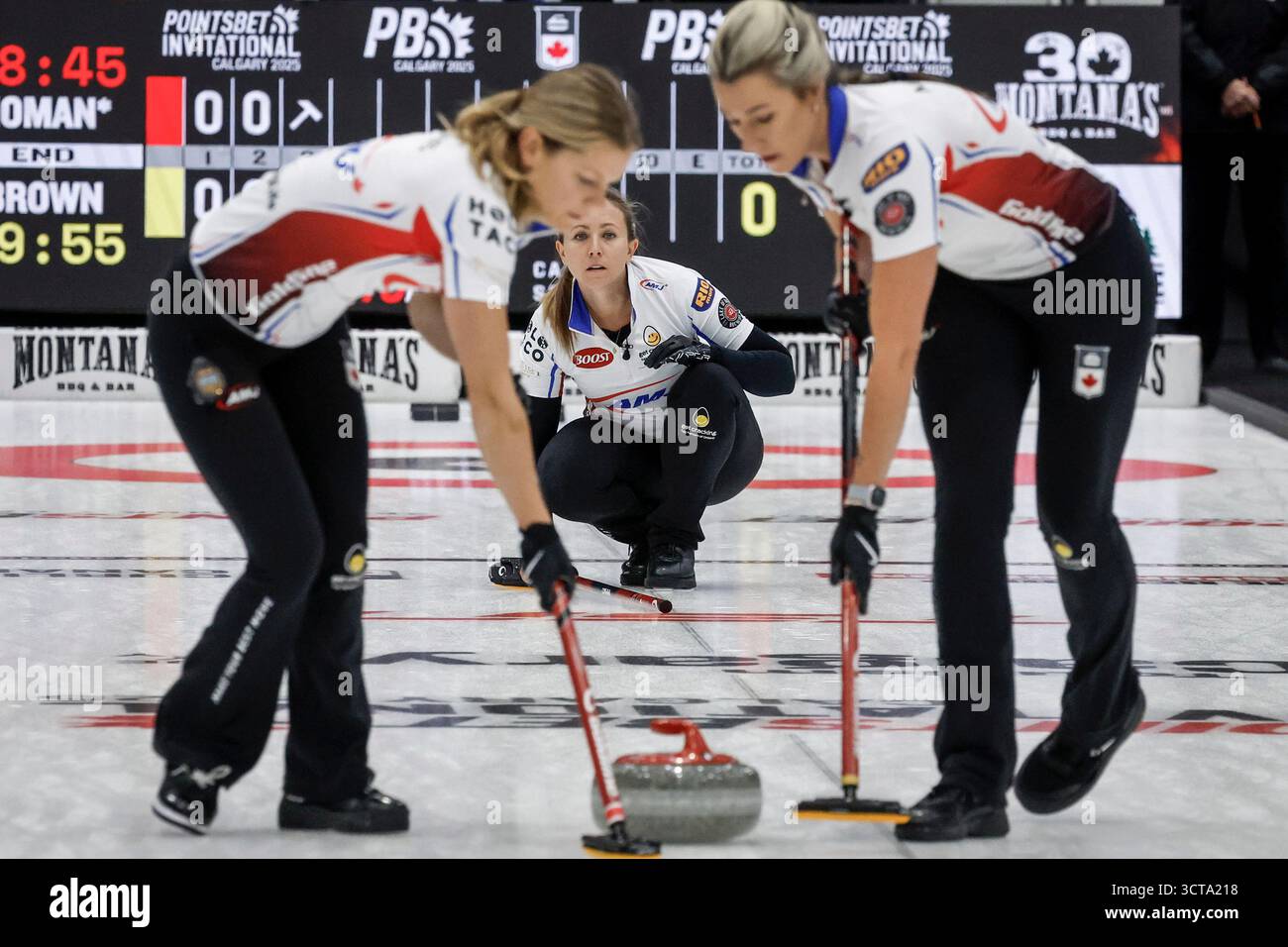 Team Homan skip Rachel Homan, centre, watches her shot as lead Sarah ...