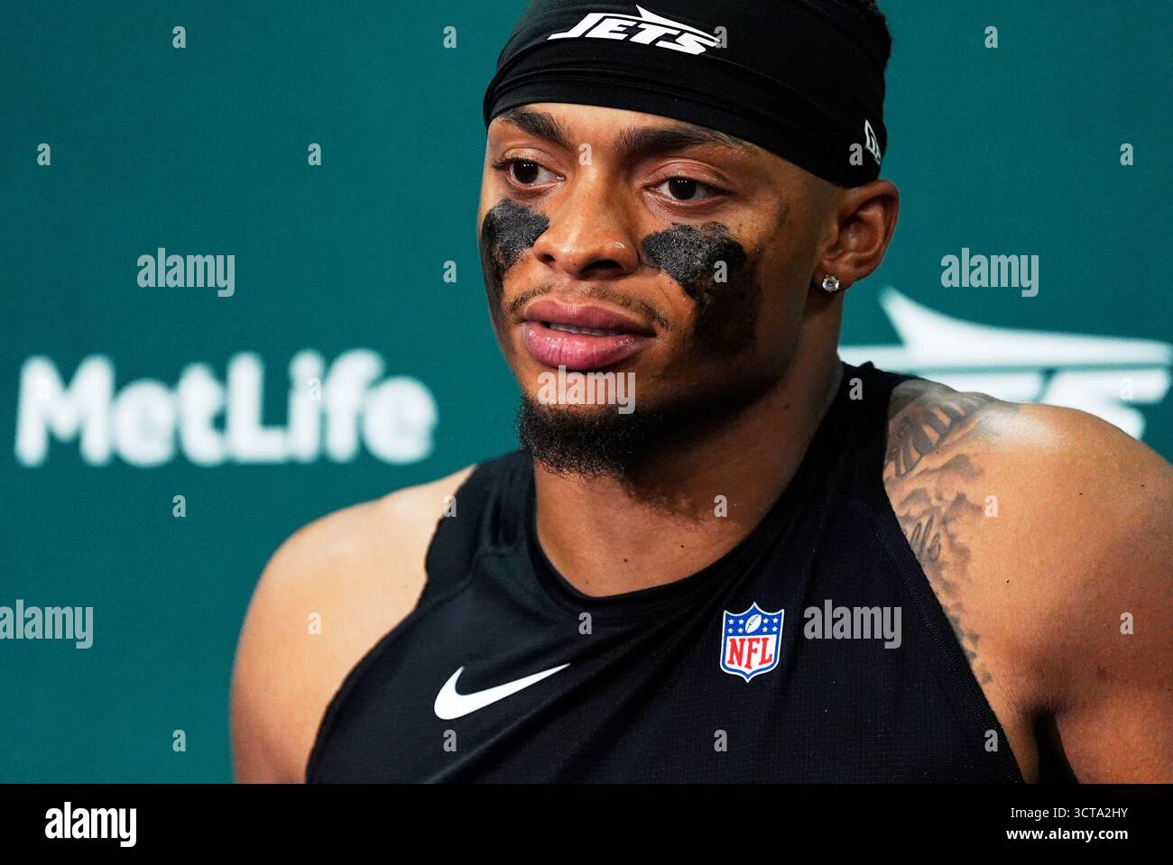 New York Jets' Justin Fields talks after an NFL football game against ...