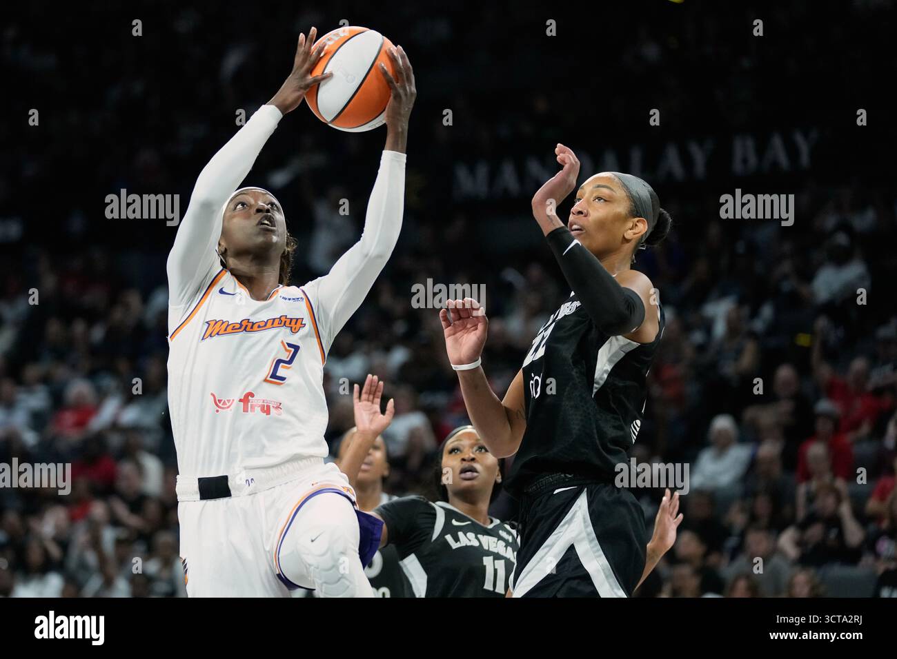 Phoenix Mercury guard Kahleah Copper (2) shoots around Las Vegas Aces ...