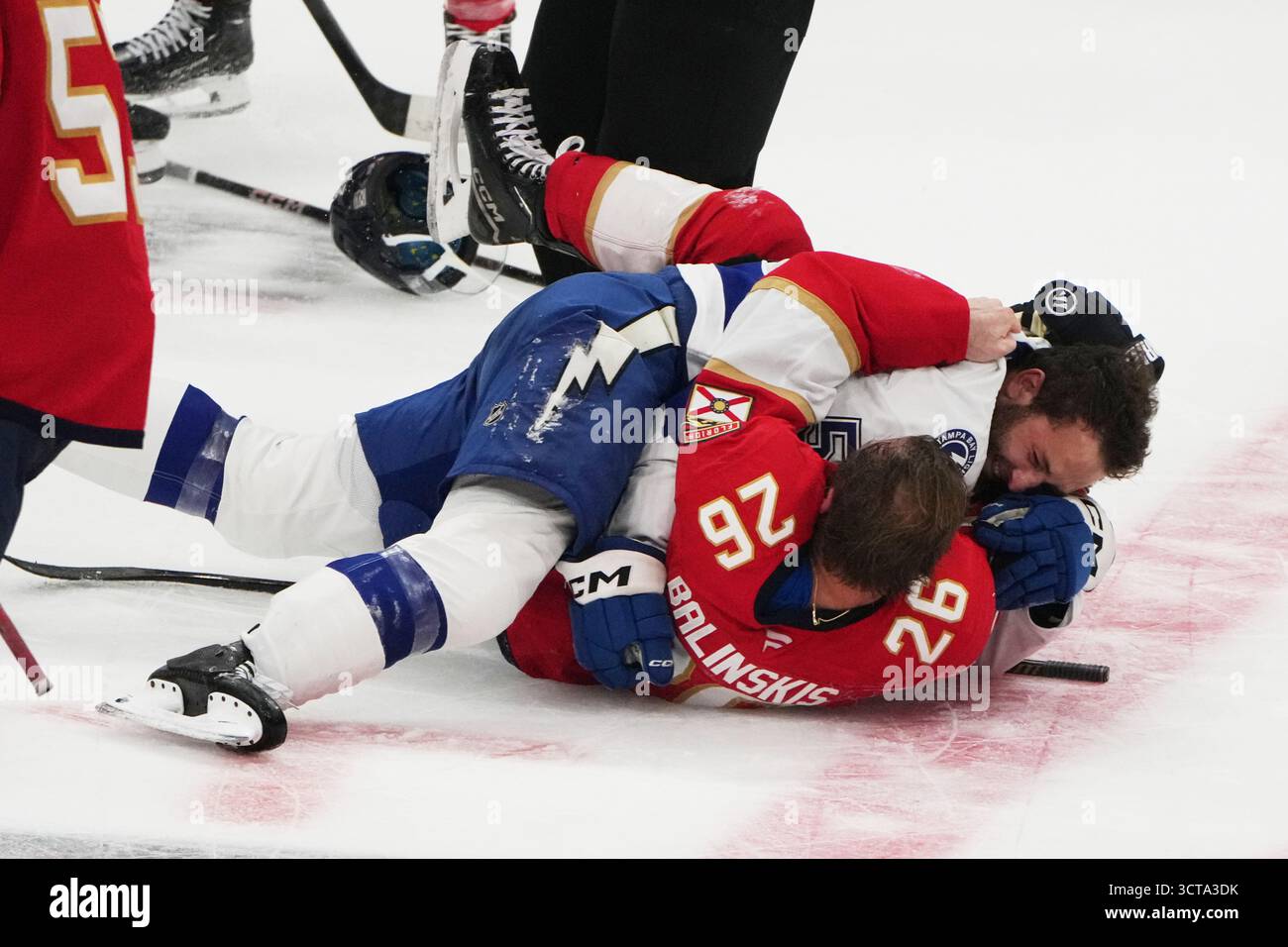 Florida Panthers defenseman Uvis Balinskis (26) and Tampa Bay Lightning ...