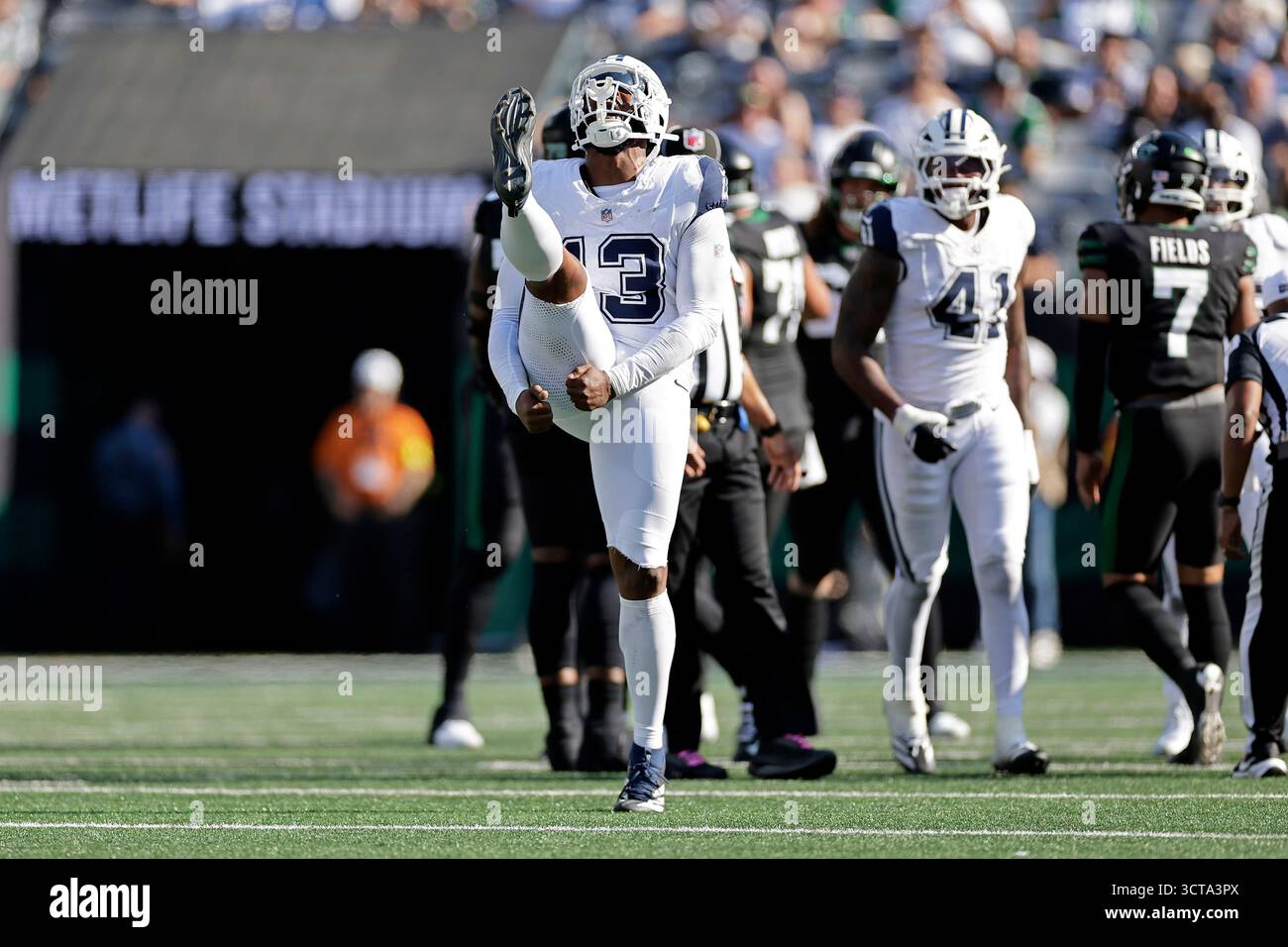 Dallas Cowboys defensive end Dante Fowler Jr. (13) reacts after sacking ...