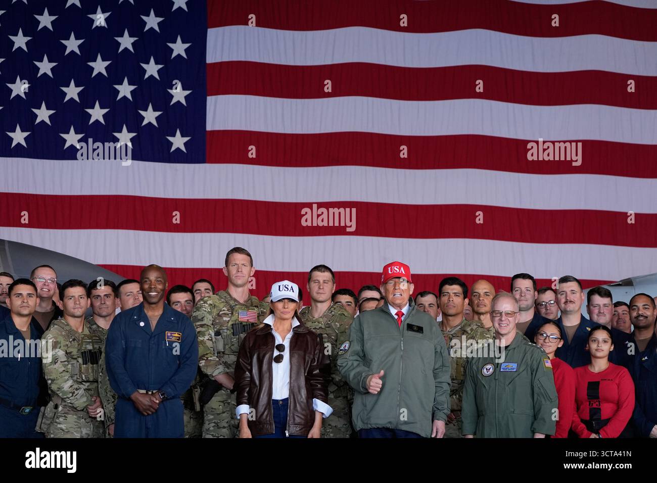 President Donald Trump and first lady Melania Trump pose for a photo as ...