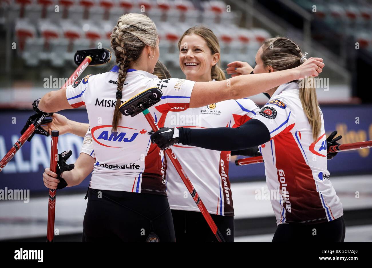 Team Homan, left to right, second Emma Miskew, third Tracy Fleury, lead ...