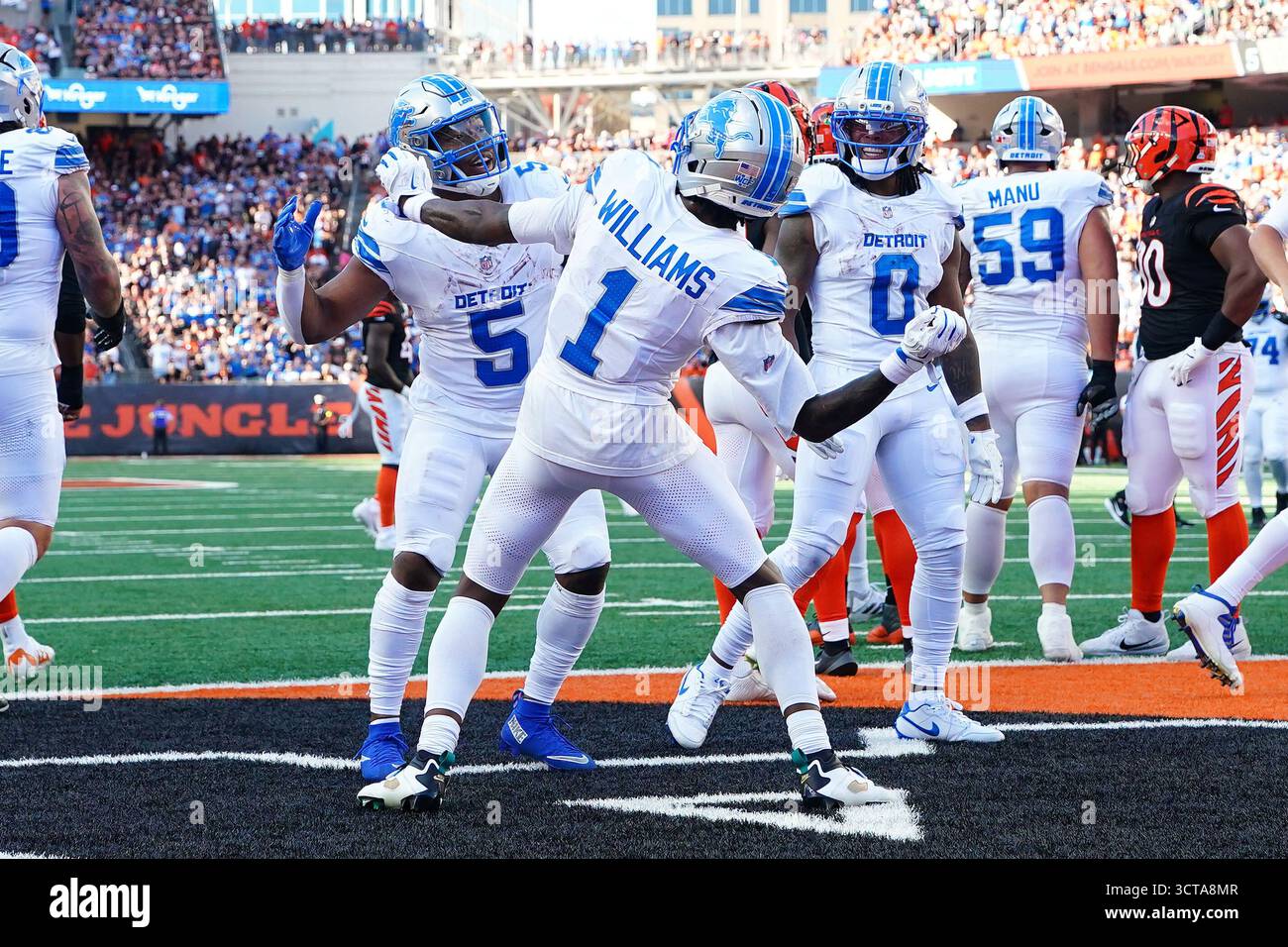 Detroit Lions running back David Montgomery (5) celebrates throwing a ...