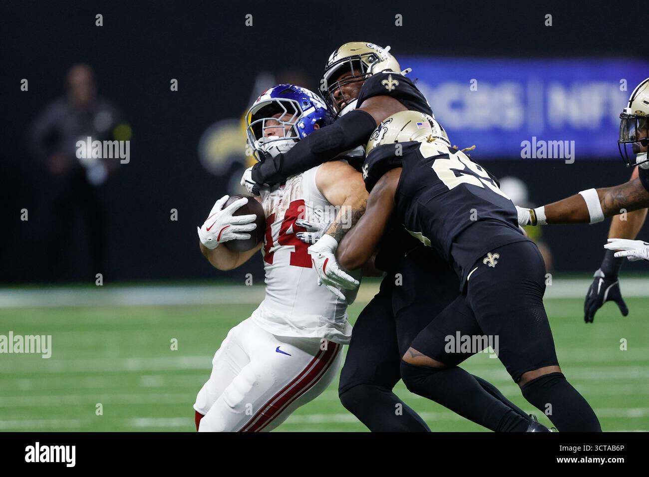 New York Giants running back Cam Skattebo (44) is tackled by New ...