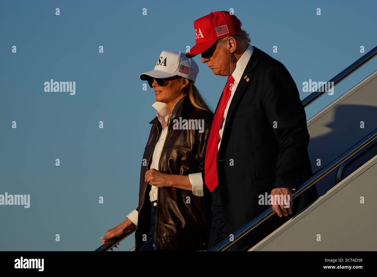 President Donald Trump arrives on Air Force One, with first lady ...