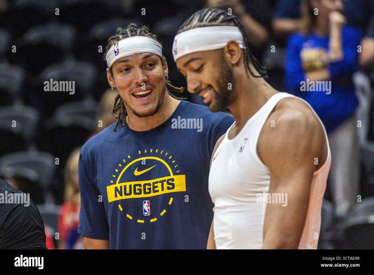Denver Nuggets forward Aaron Gordon, left, talks with forward Zeke ...