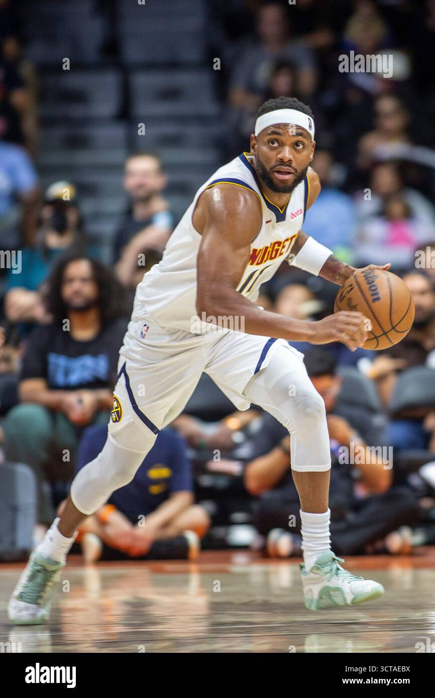 Denver Nuggets forward Bruce Brown dribbles during the first half of a ...