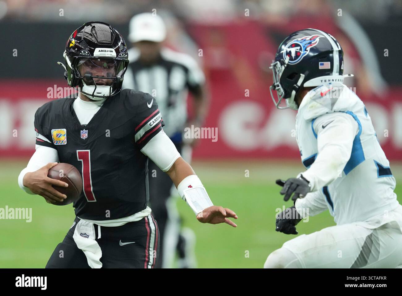 Arizona Cardinals quarterback Kyler Murray (1) runs the ball against ...