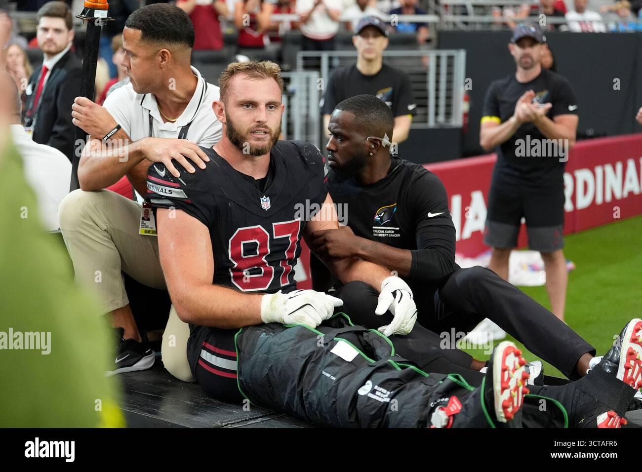 Arizona Cardinals tight end Tip Reiman (87) is carted off the field ...