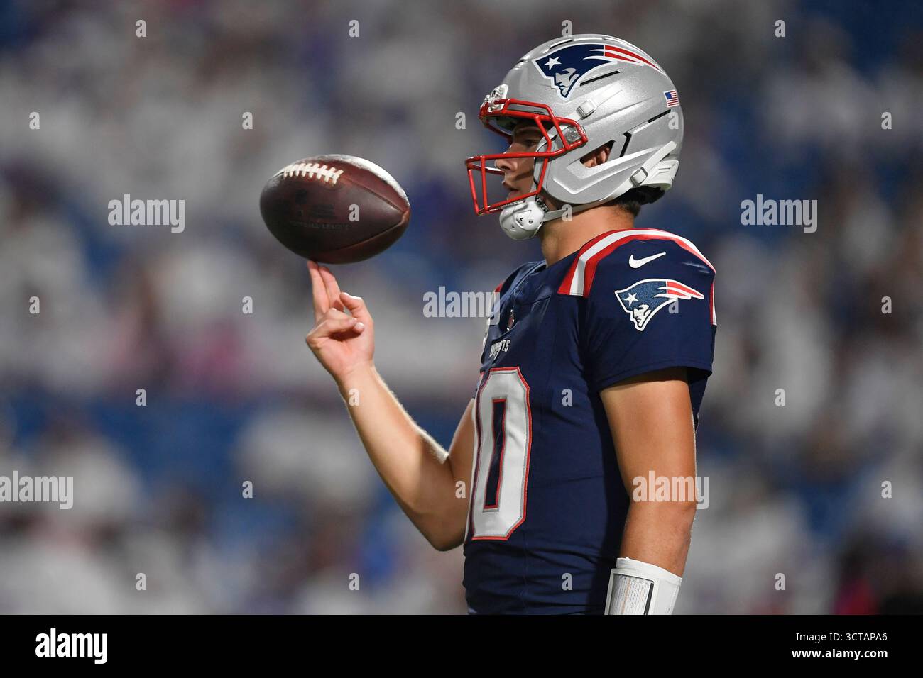 New England Patriots quarterback Drake Maye (10) warms up for an NFL ...